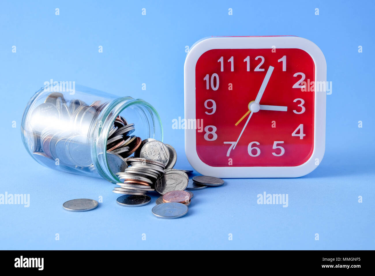 save-money-for-investment-concept-coin-baht-thai-with-alarm-clocks