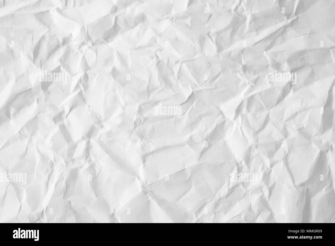 Crumpled white paper background texture Stock Photo - Alamy