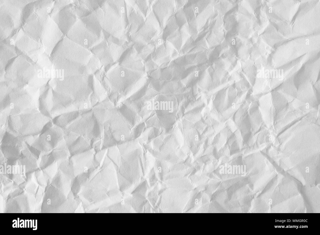 Crumpled white paper background texture Stock Photo - Alamy