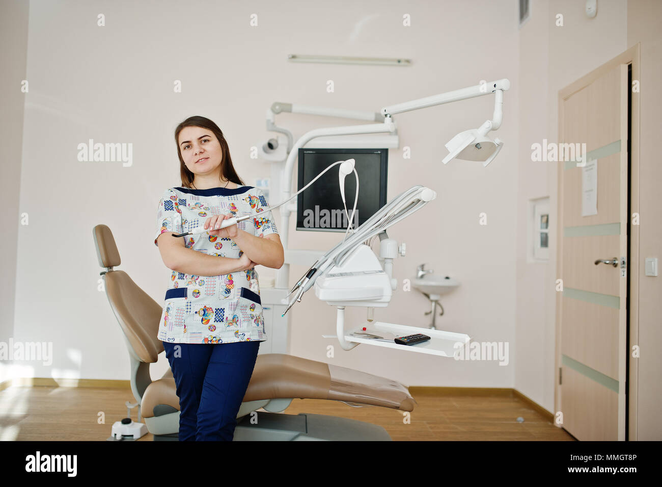 Portrait of baby dentist female at her dental office Stock Photo - Alamy