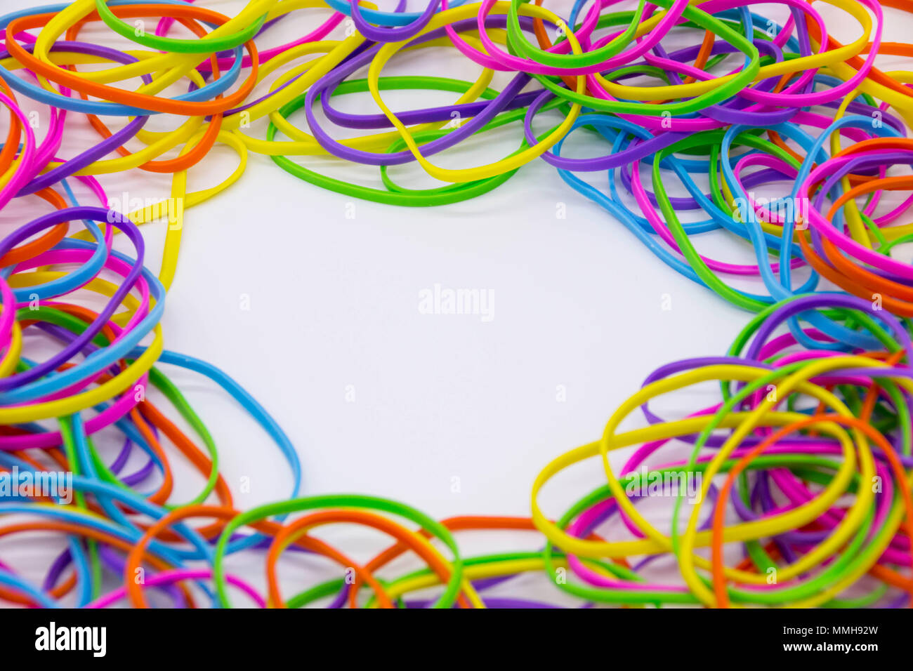 Neon coloured rubber bands hi-res stock photography and images - Alamy