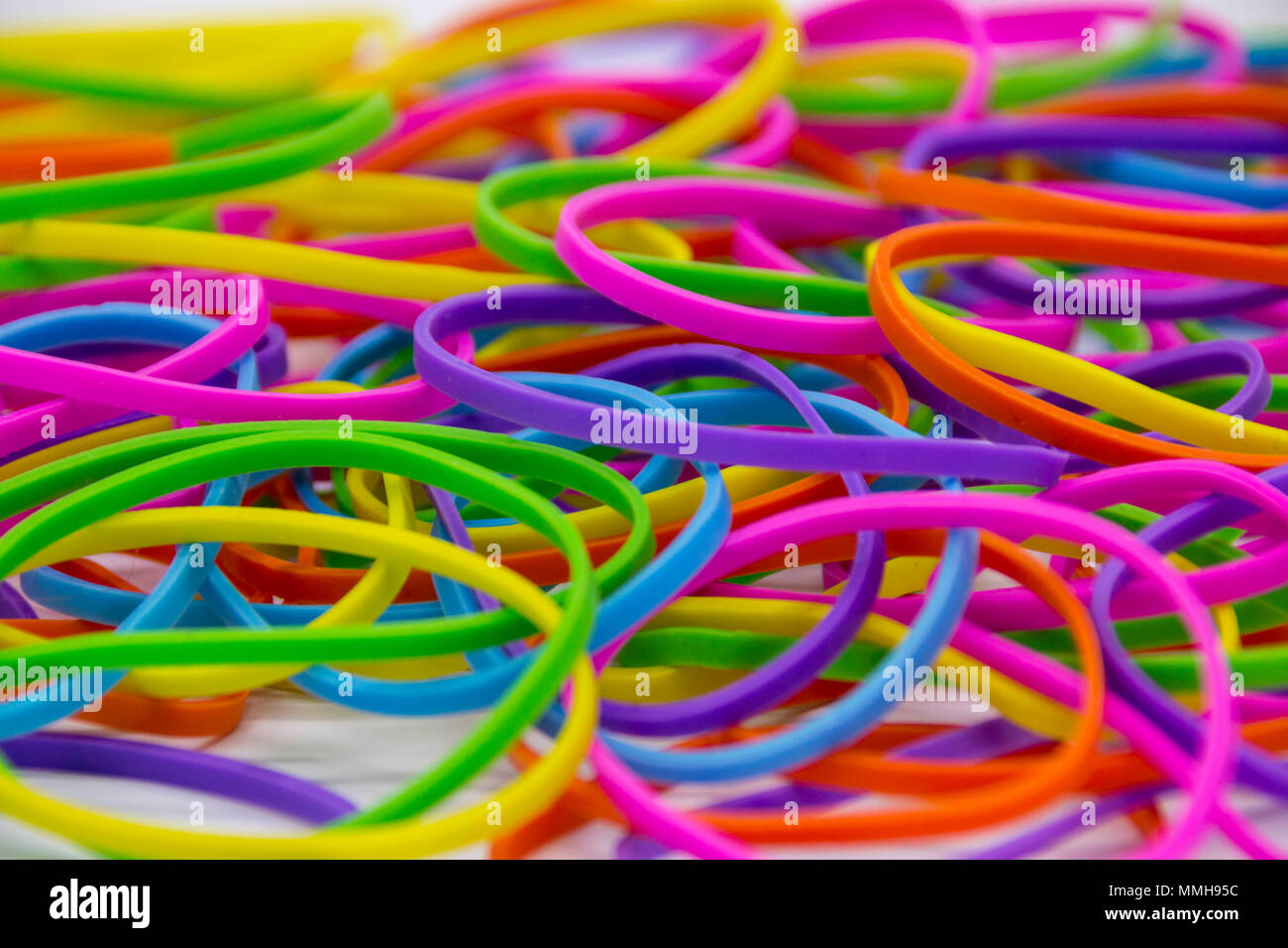 Colorful neon elastic / rubber bands Stock Photo - Alamy