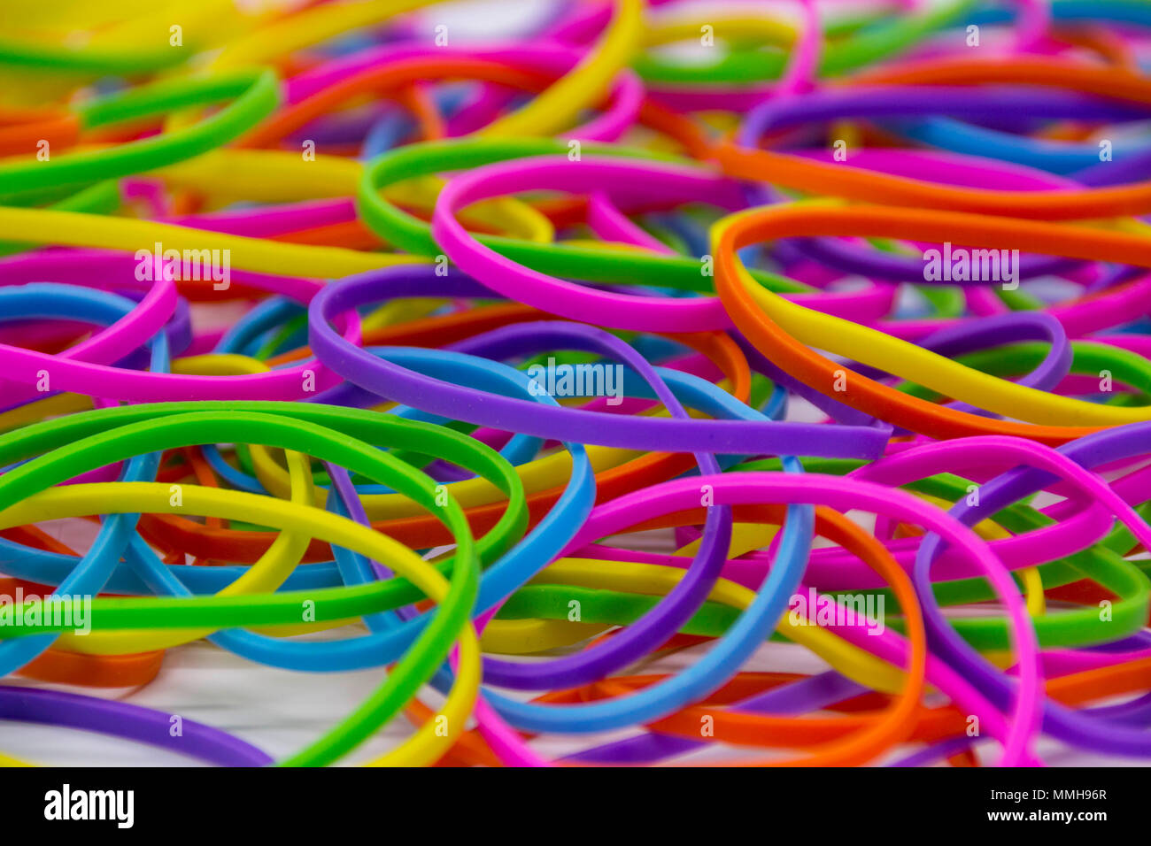 Colorful neon elastic / rubber bands Stock Photo - Alamy