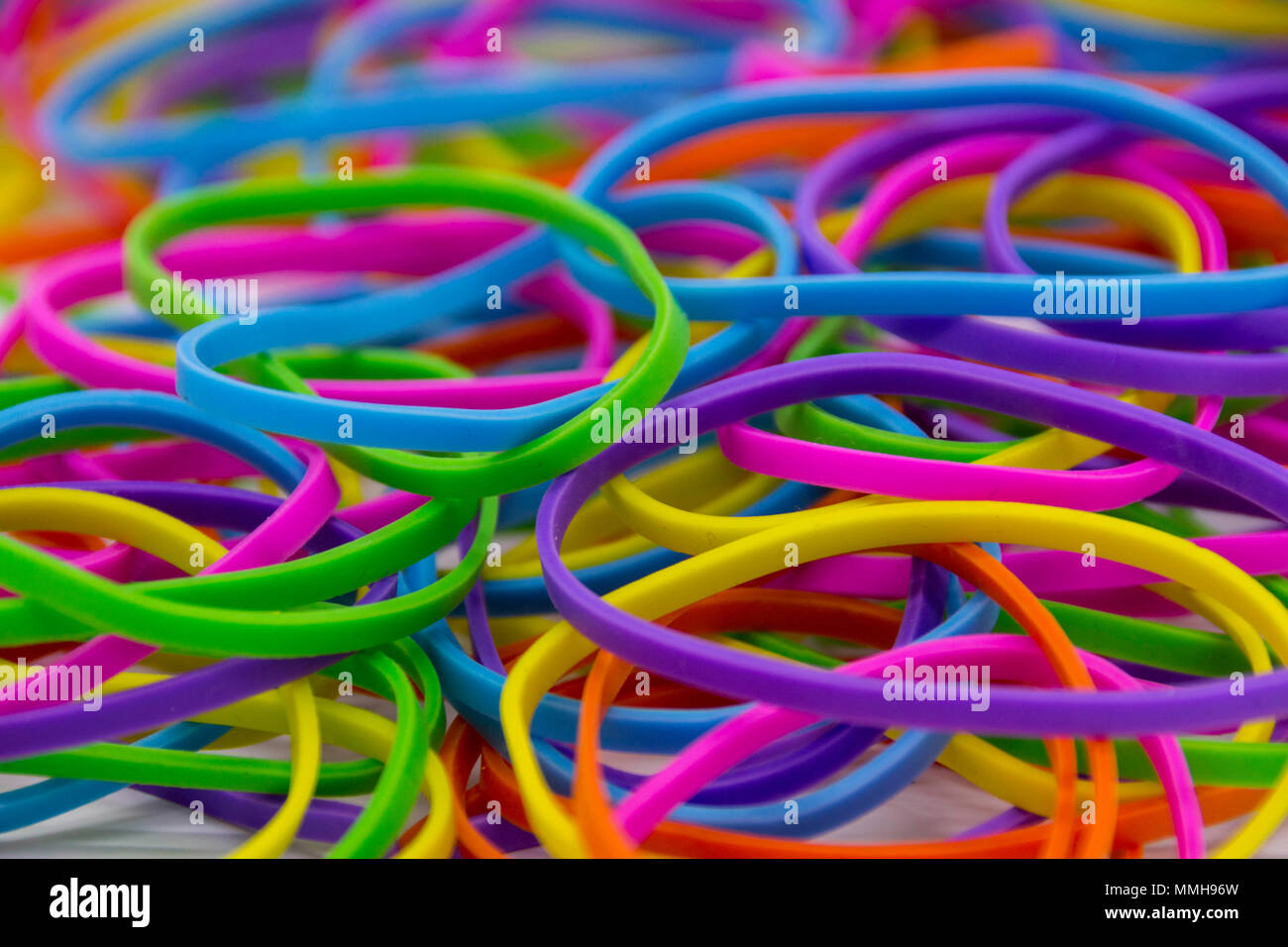 Colorful neon elastic / rubber bands Stock Photo - Alamy
