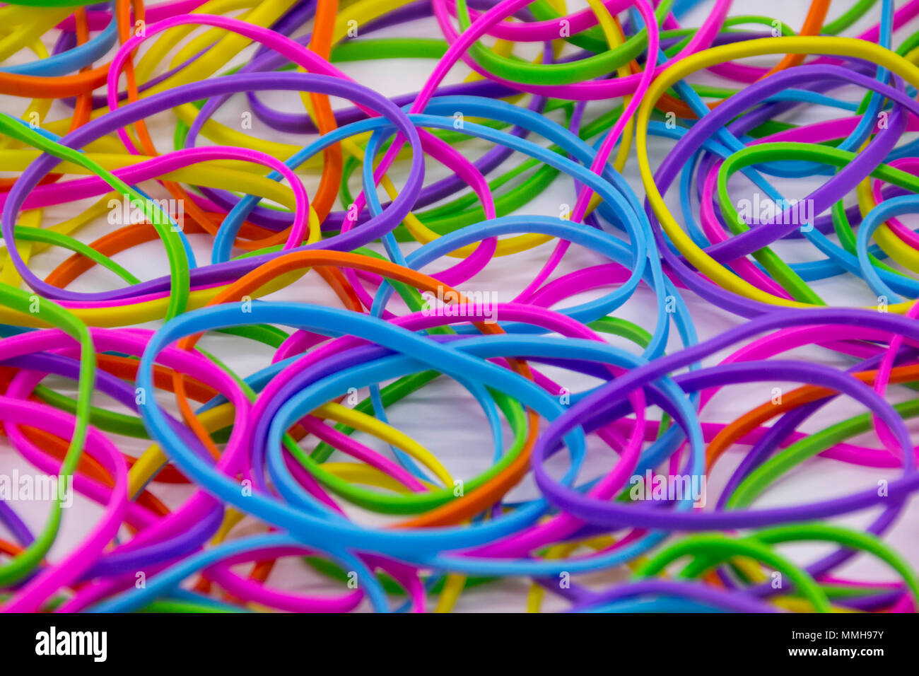 Colorful neon elastic / rubber bands Stock Photo - Alamy