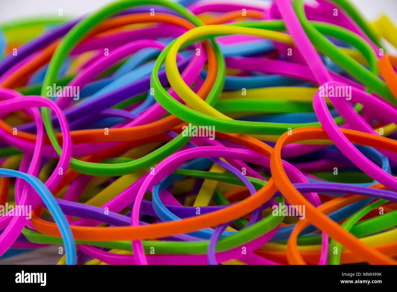 Colorful neon elastic / rubber bands Stock Photo - Alamy
