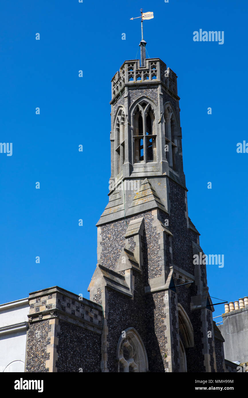 A view of the tower of the historic Holy Trinity Church, located on ...