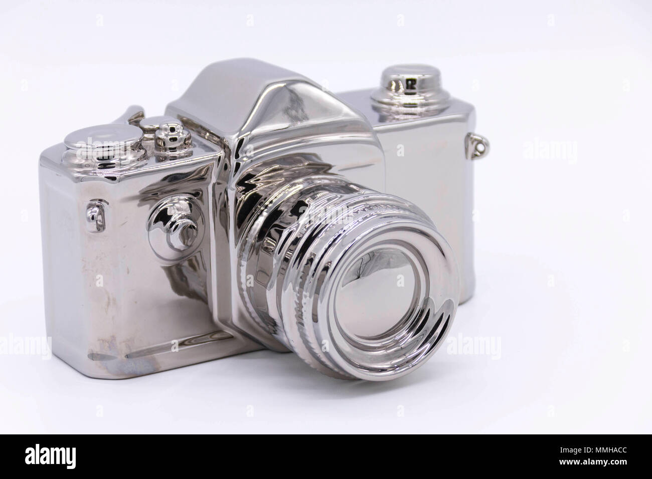 Camera ornament on a white background Stock Photo - Alamy