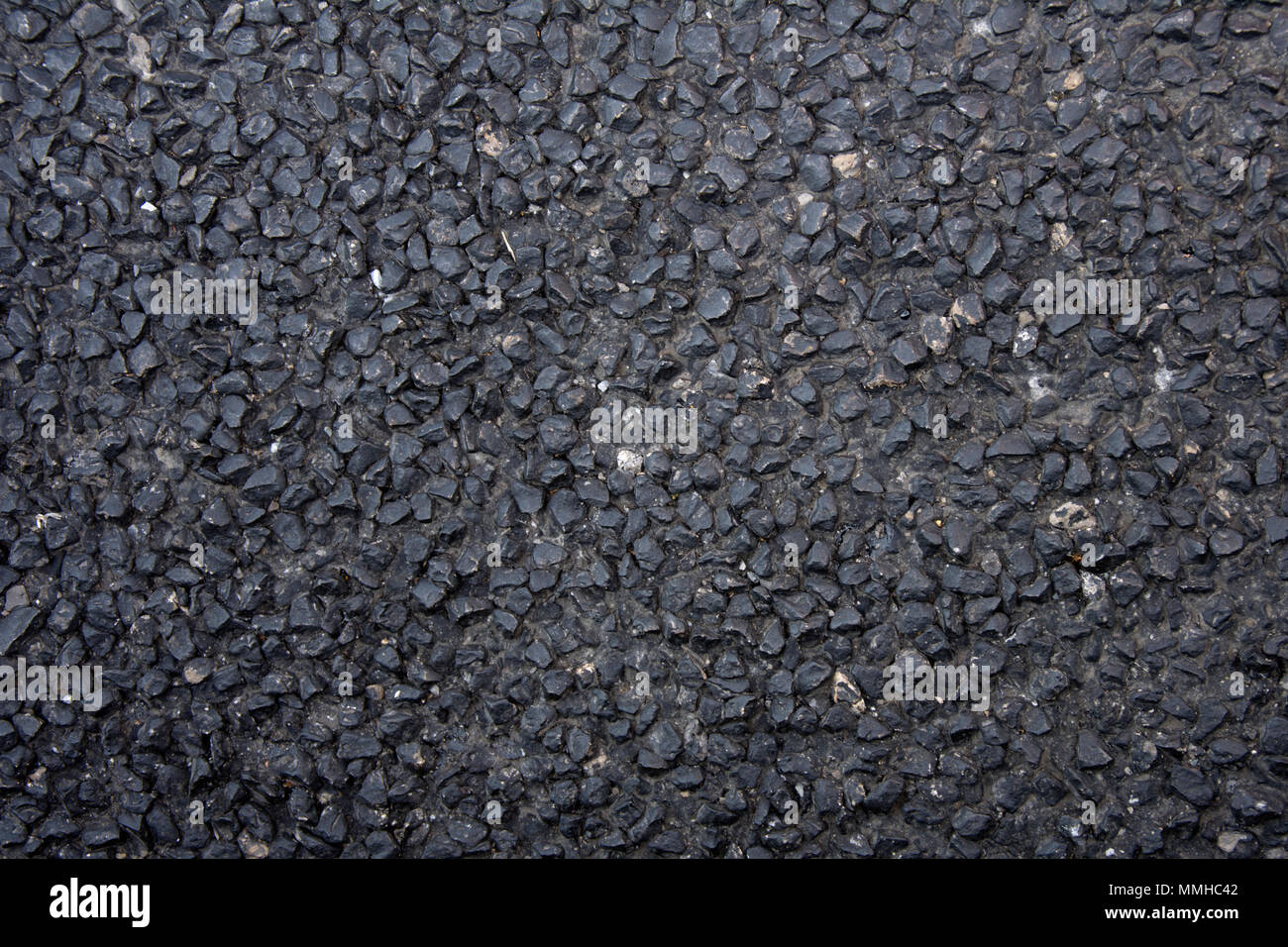 background from new asphalt with bitumen and stones Stock Photo - Alamy