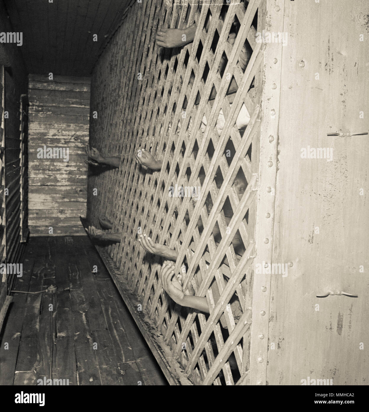 Prisoners locked in tiny jail cells in Greene County, Georgia - 1941 ...