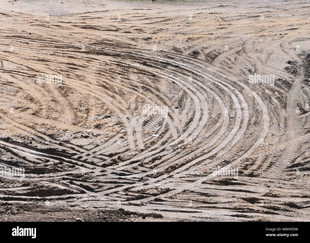 Wheel track mark on sand in construction site Stock Photo - Alamy