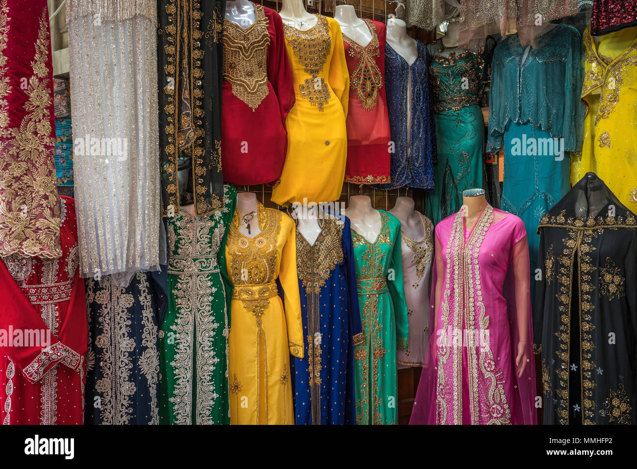 Clothes and textiles for sale in the textile markets of old town Duba ...