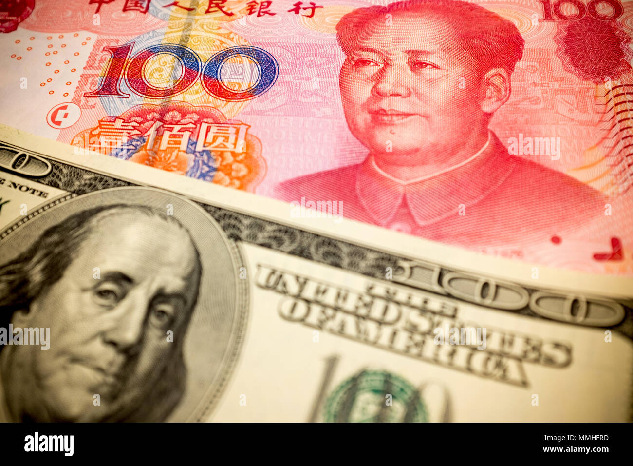 Chinese Yuan Note and U.S. dollar background (Exchange rate concept ...