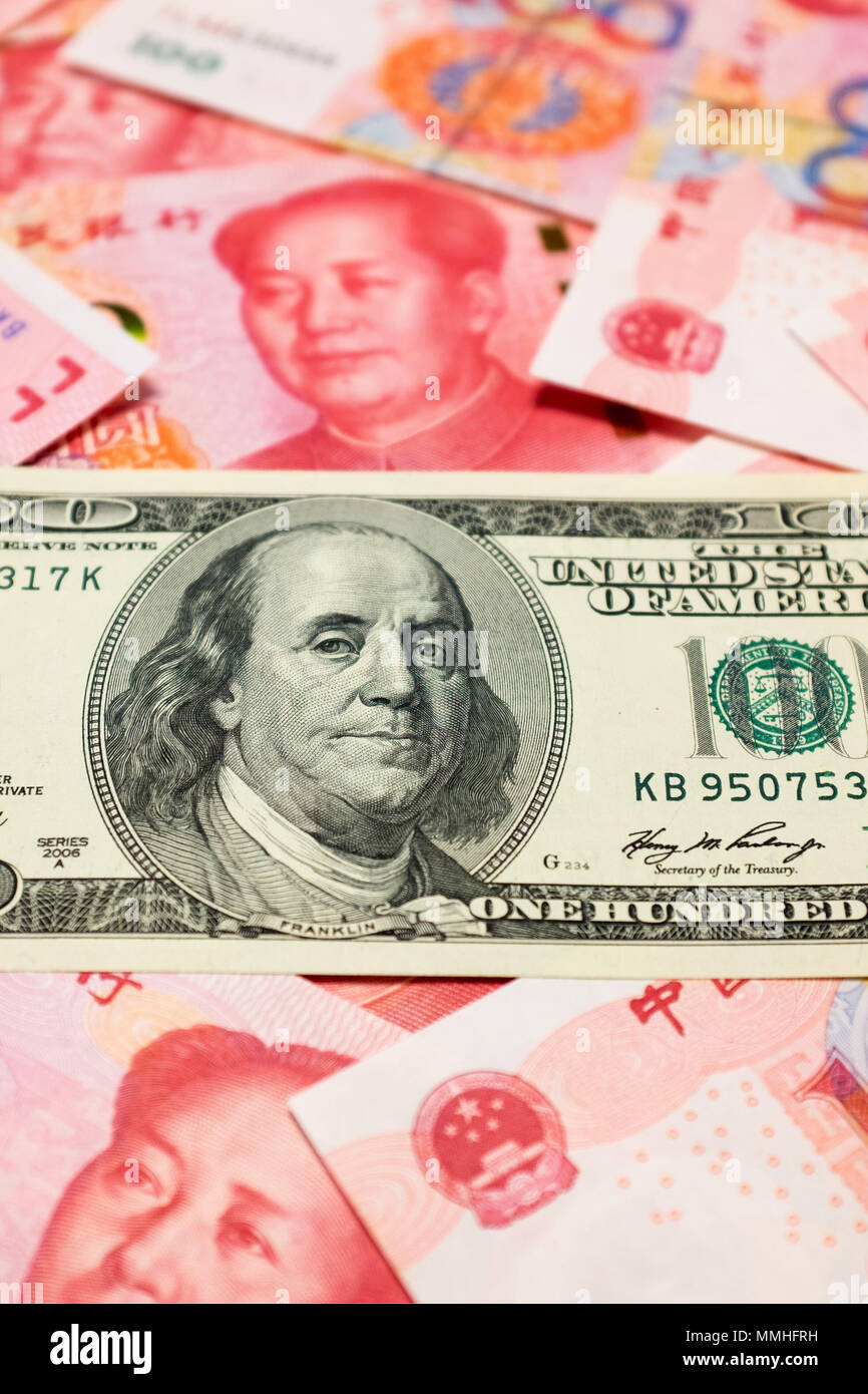 Chinese Yuan Note and U.S. dollar background (Exchange rate concept ...