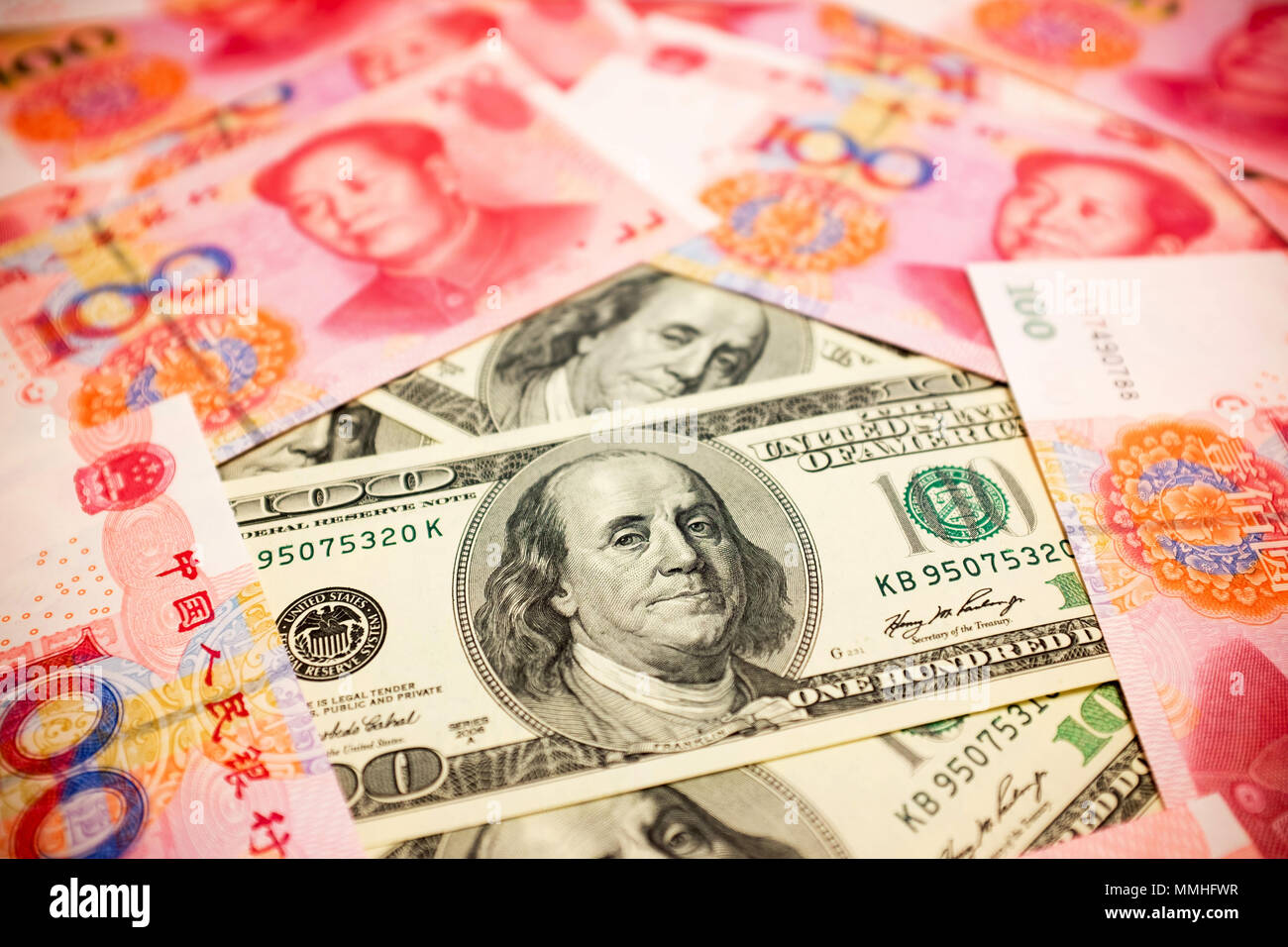 Chinese Yuan Note and U.S. dollar background (Exchange rate concept ...