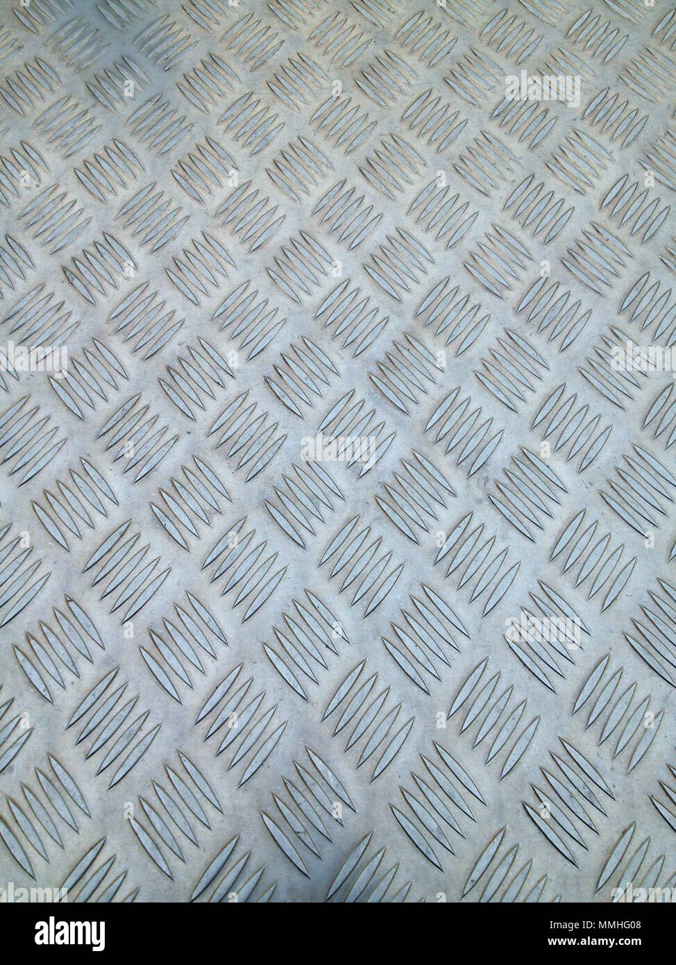 Metal diamond plate texture background Stock Photo - Alamy