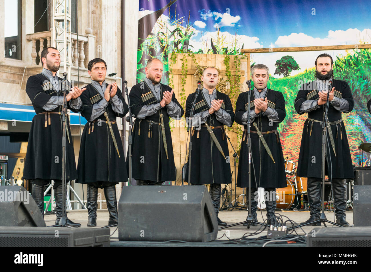Georgian people in national costumes hi-res stock photography and ...