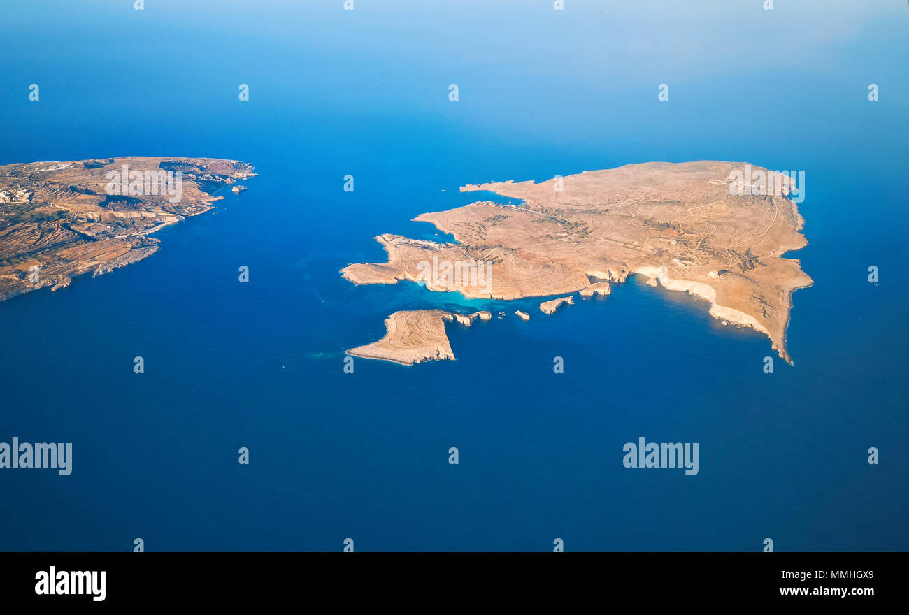 Comino island and blue lagoon with azure water from above, Malta, EU ...