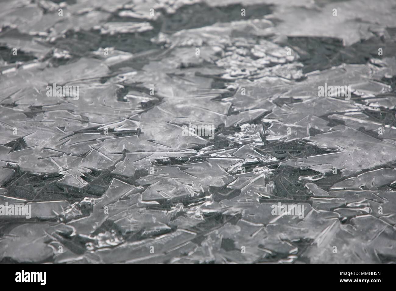 Frozen lake ice patterns Stock Photo - Alamy