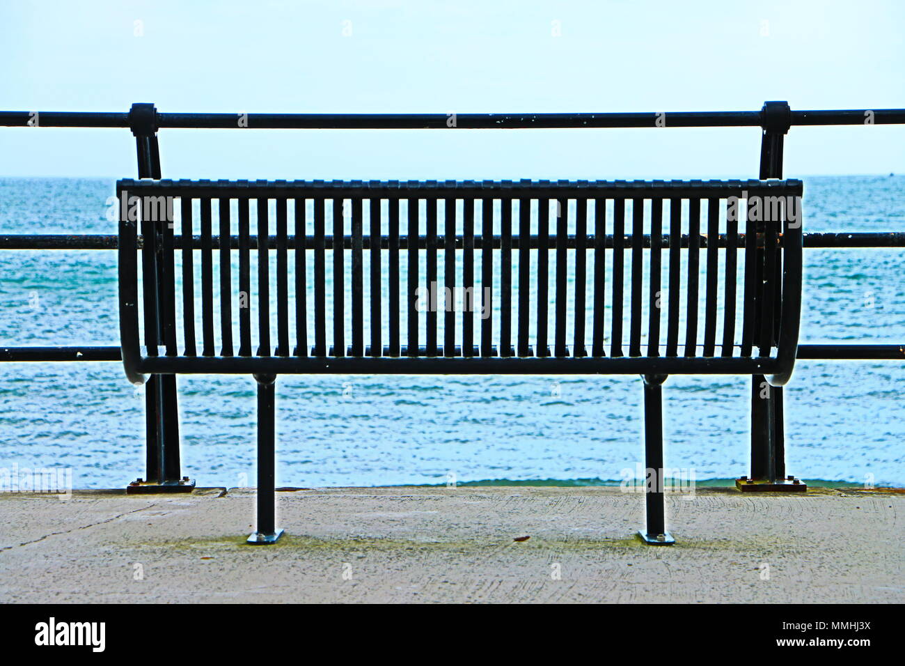 Empty bench looking out sea hi-res stock photography and images - Alamy