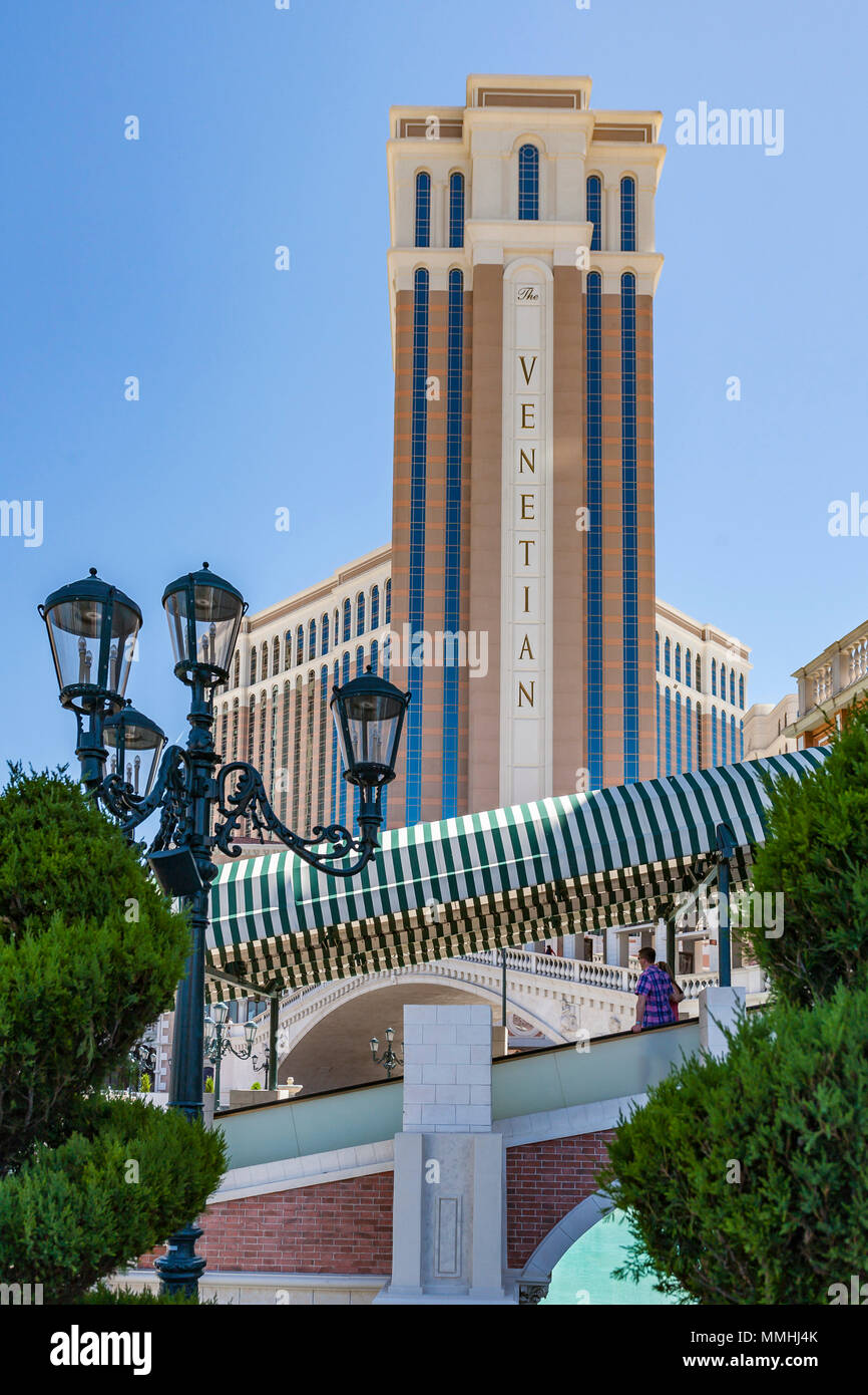 The Venetian Resort Hotel Casino towers above a covered walkway on the ...