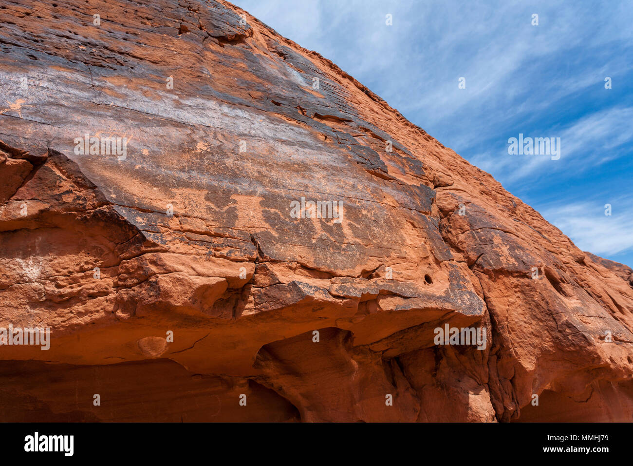 Symbols etched in red Aztec sandstone rock formations in the Valley of ...