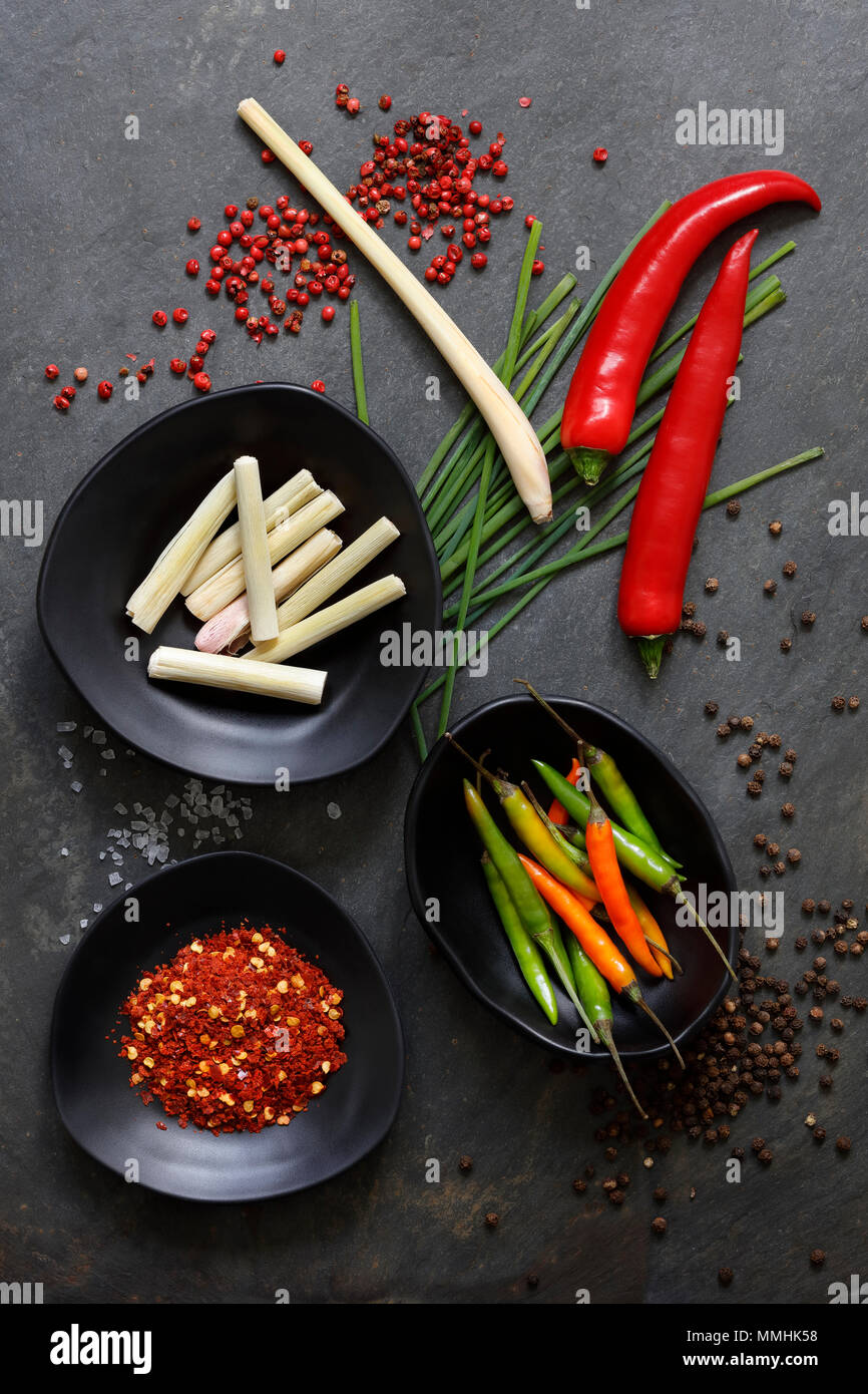 Ground dried chilli peppers with fresh peppers, lemon grass and chives ...
