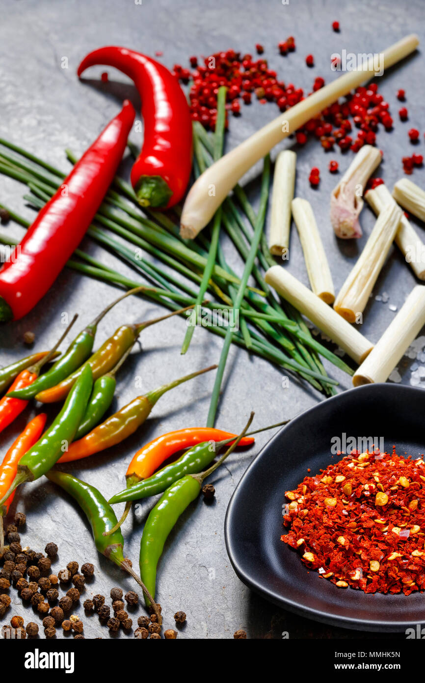 Ground dried chilli peppers with fresh peppers, lemon grass and chives ...