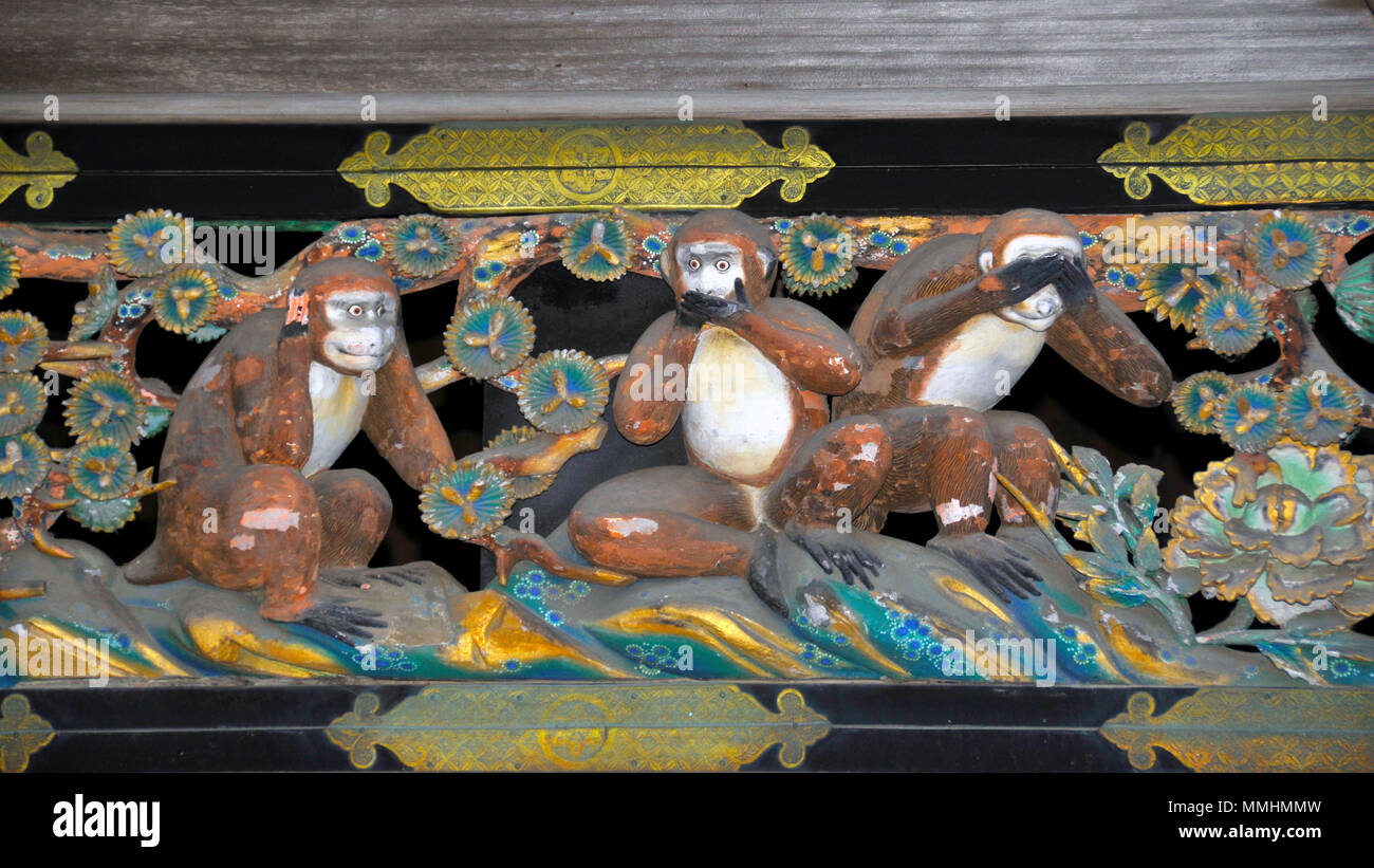 Three wise monkeys wooden inlay at the stables of the Toshogu Shrine or ...