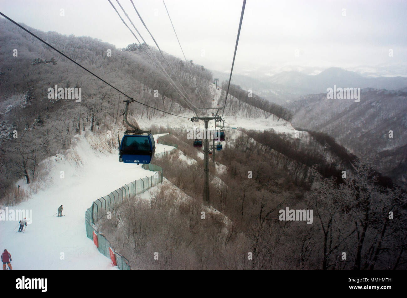 Ski track and cable car at Yongpyong Alpine Center ski resort ...