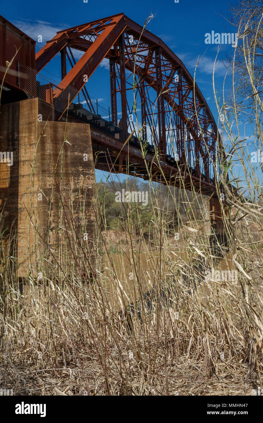 Iron Railroad Bridge over water, Texas Stock Photo - Alamy
