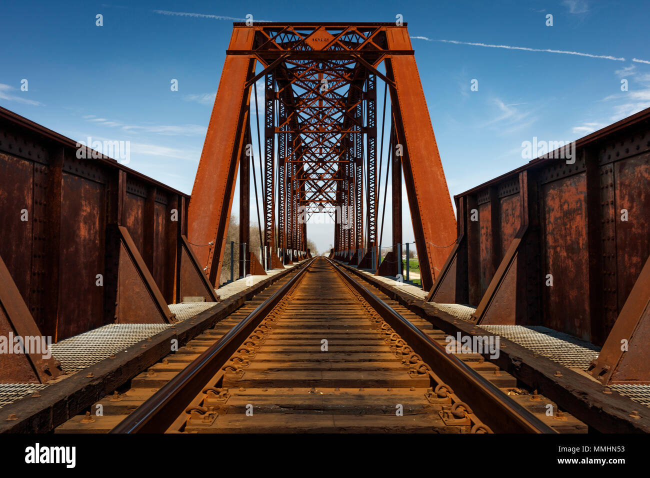 Iron Railroad Bridge over water, Texas Stock Photo - Alamy