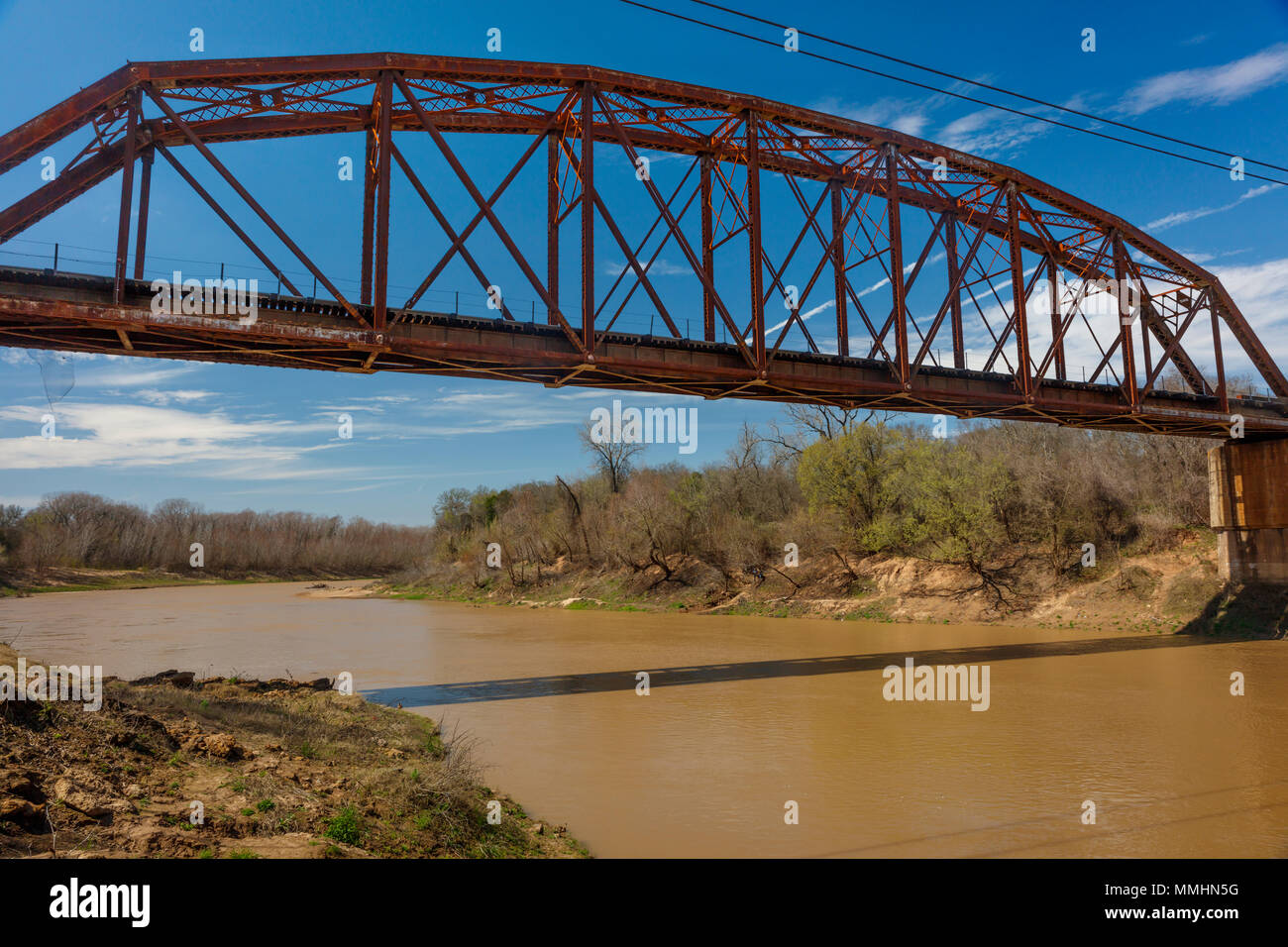 Iron Railroad Bridge over water, Texas Stock Photo - Alamy