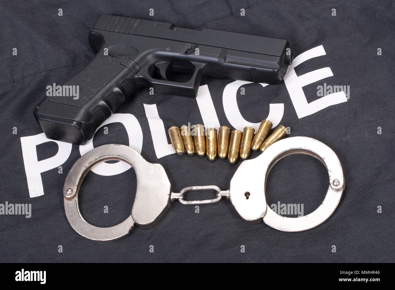 Police Badge Handcuffs Stock Photos & Police Badge Handcuffs Stock ...