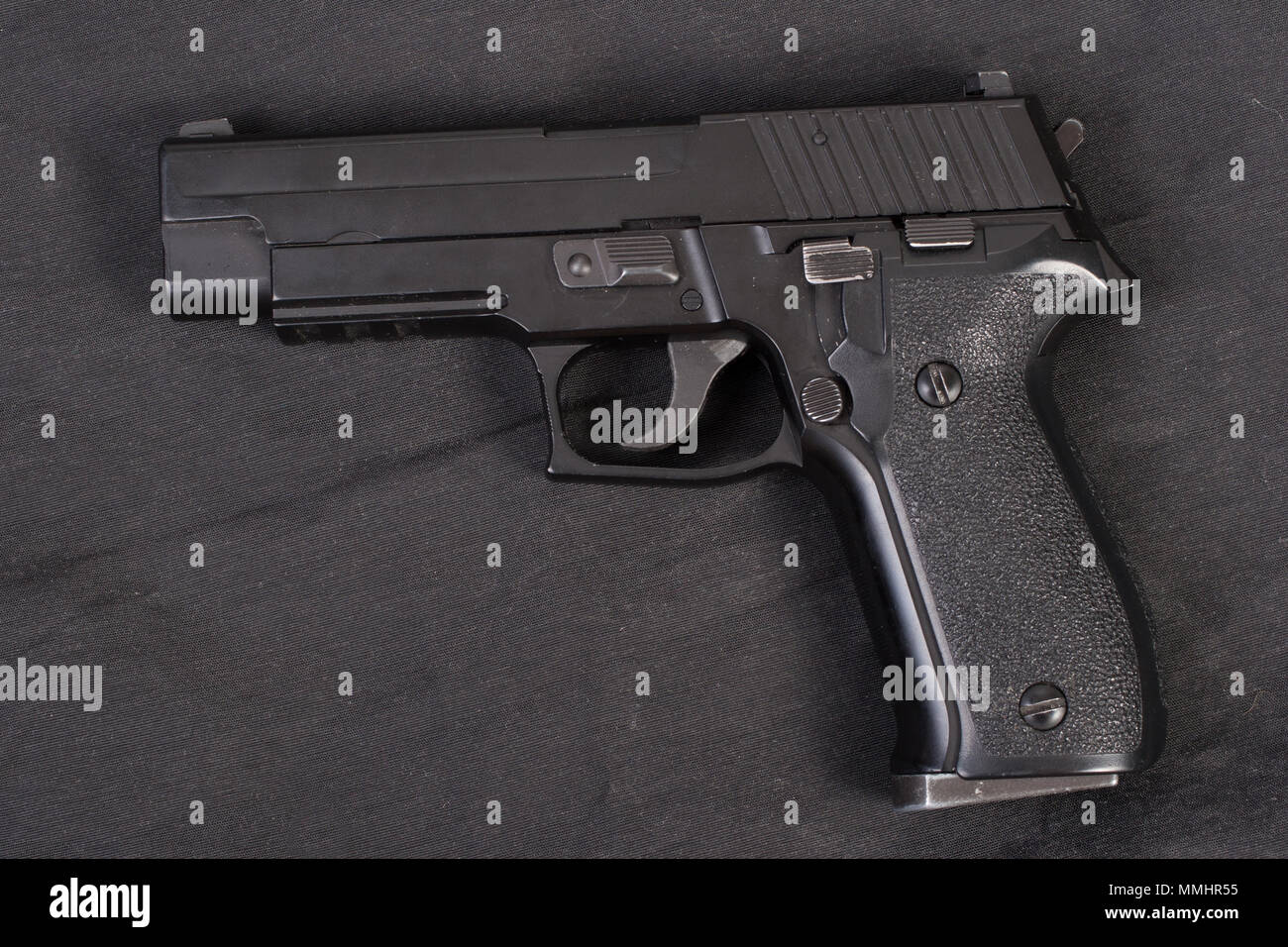 sig sauer hand gun on black Stock Photo - Alamy