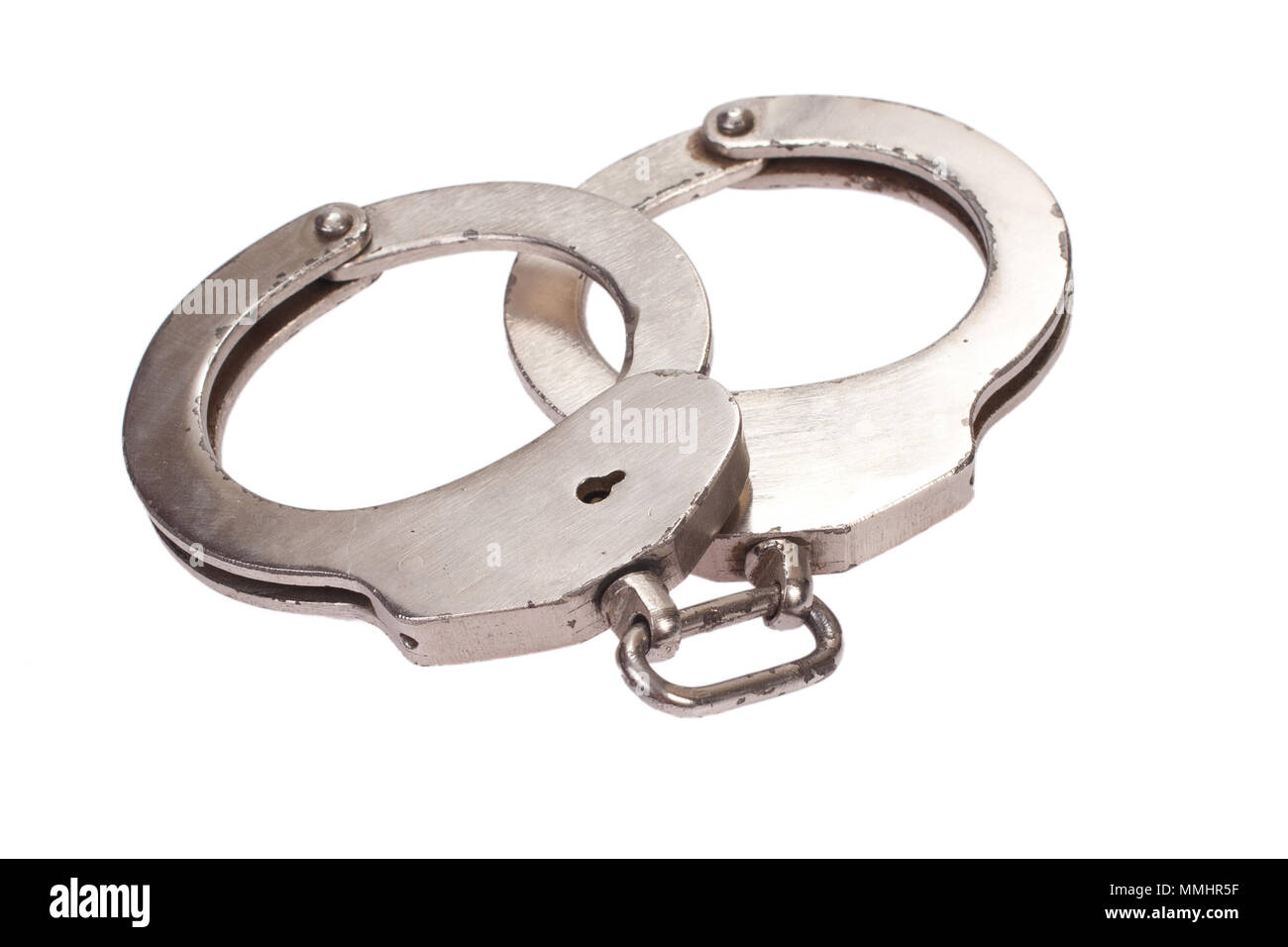 handcuffs isolated on white background Stock Photo - Alamy
