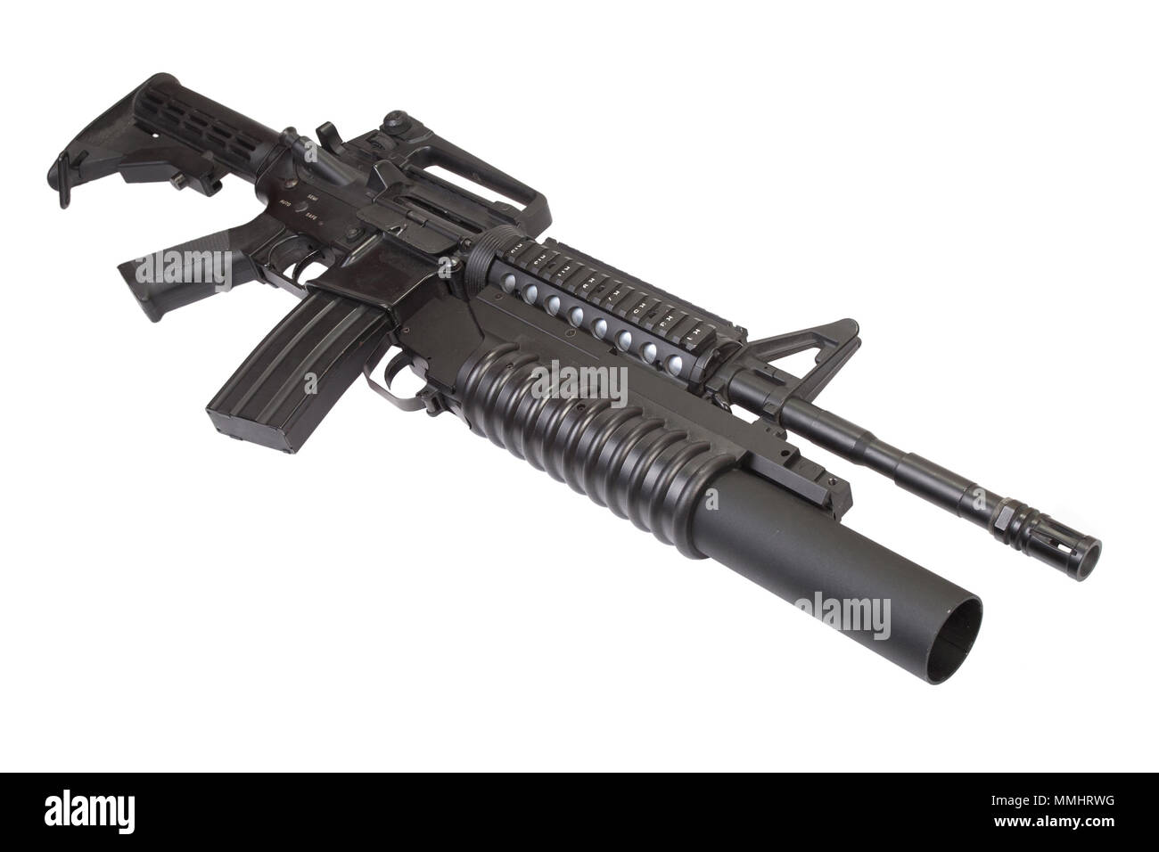 An M4A1 SOPMOD carbine equipped with an M203 grenade launcher Stock ...