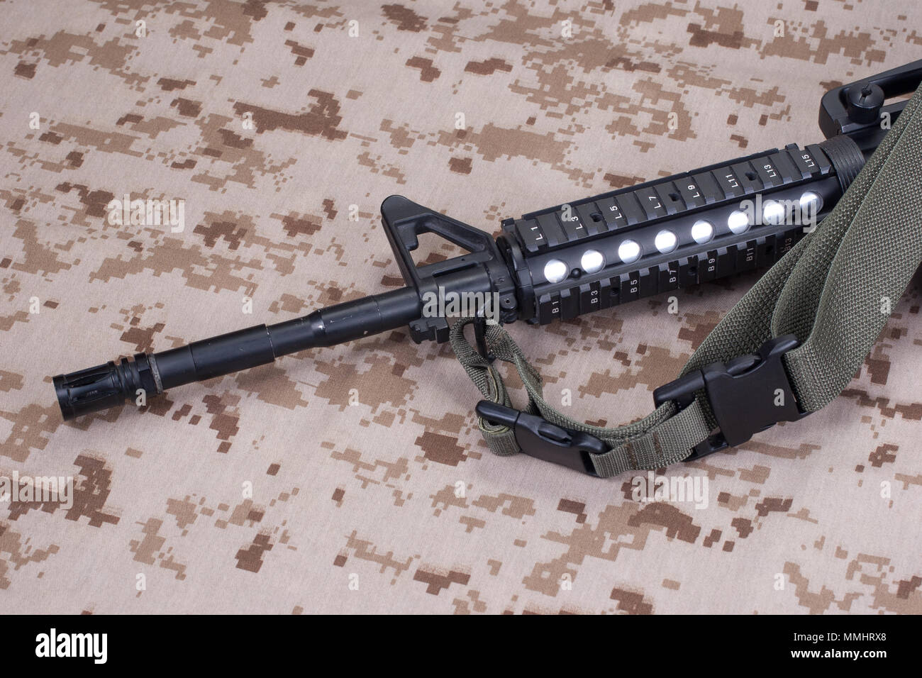 m4 carbine on camouflage uniform Stock Photo - Alamy