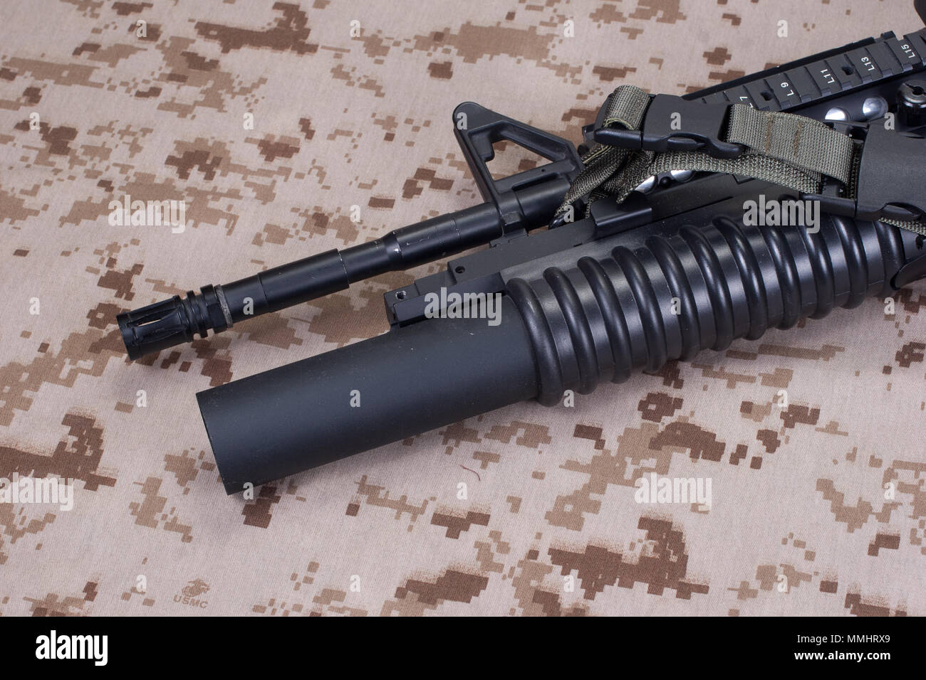 m4 carbine on camouflage uniform Stock Photo - Alamy