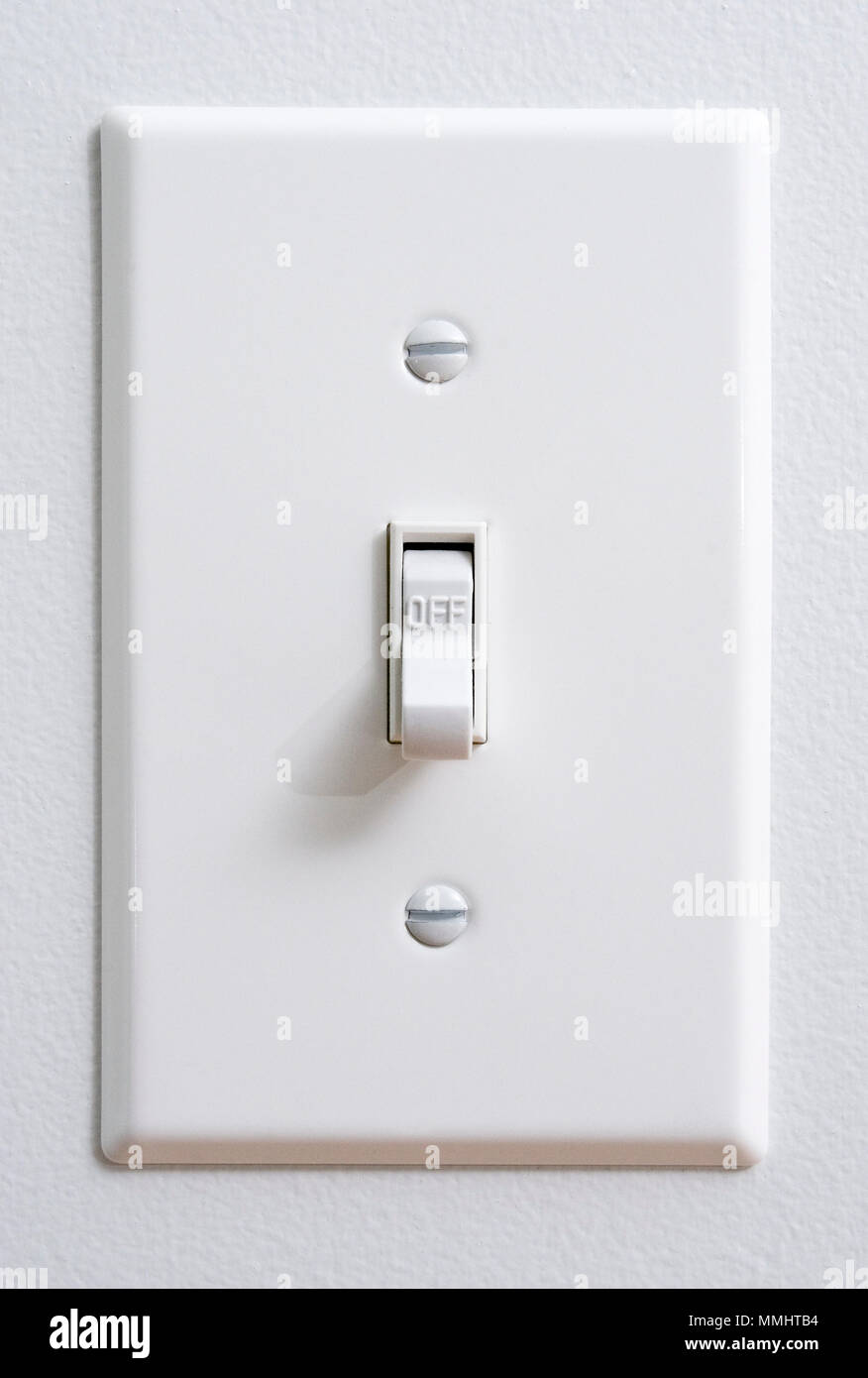 Eco friendly, renewable power, white electric switch on white wall ...