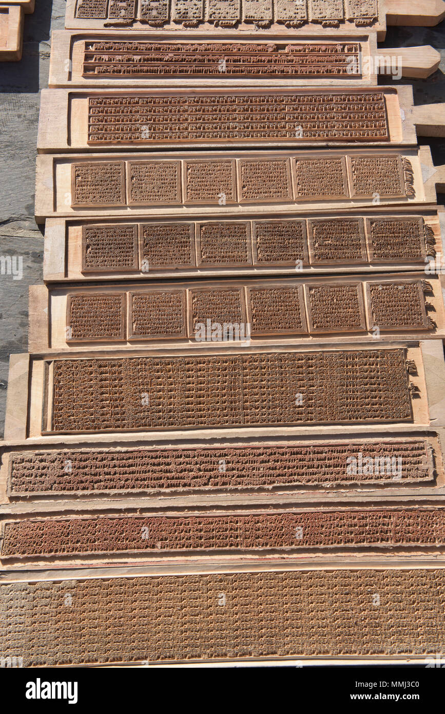 Drying Tibetan woodblock prints at the holy Bakong Scripture Printing ...