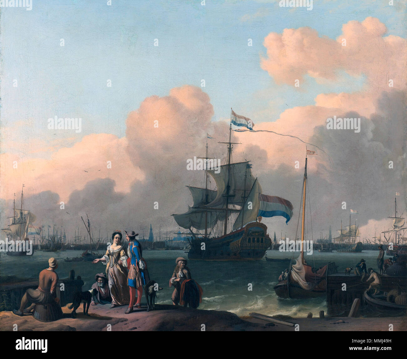 . View of a port with many larger and smaller ships including the tall ...