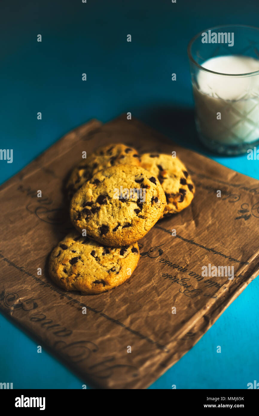 Moody cookies and milk Stock Photo - Alamy