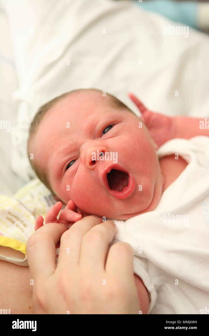 Comforted baby hi-res stock photography and images - Alamy