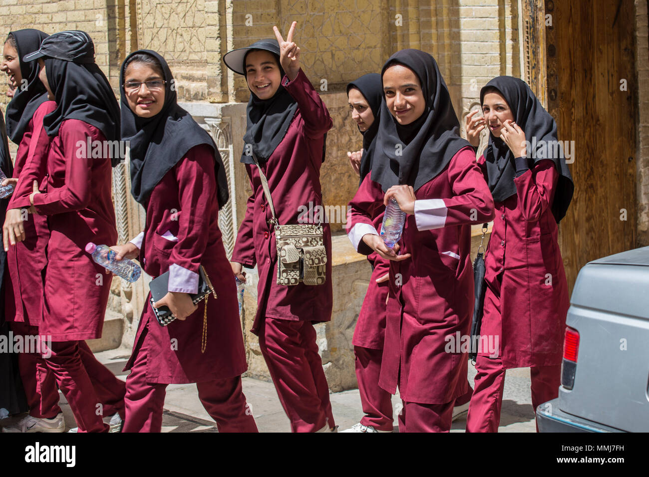 SHIRAZ, IRAN - APRIL 26, 2015: unidentified young female students out ...