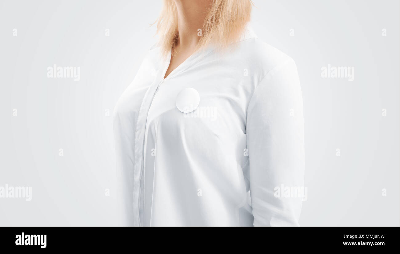 Blank button badge mockup pinned on the womans chest, side view. Girl ...
