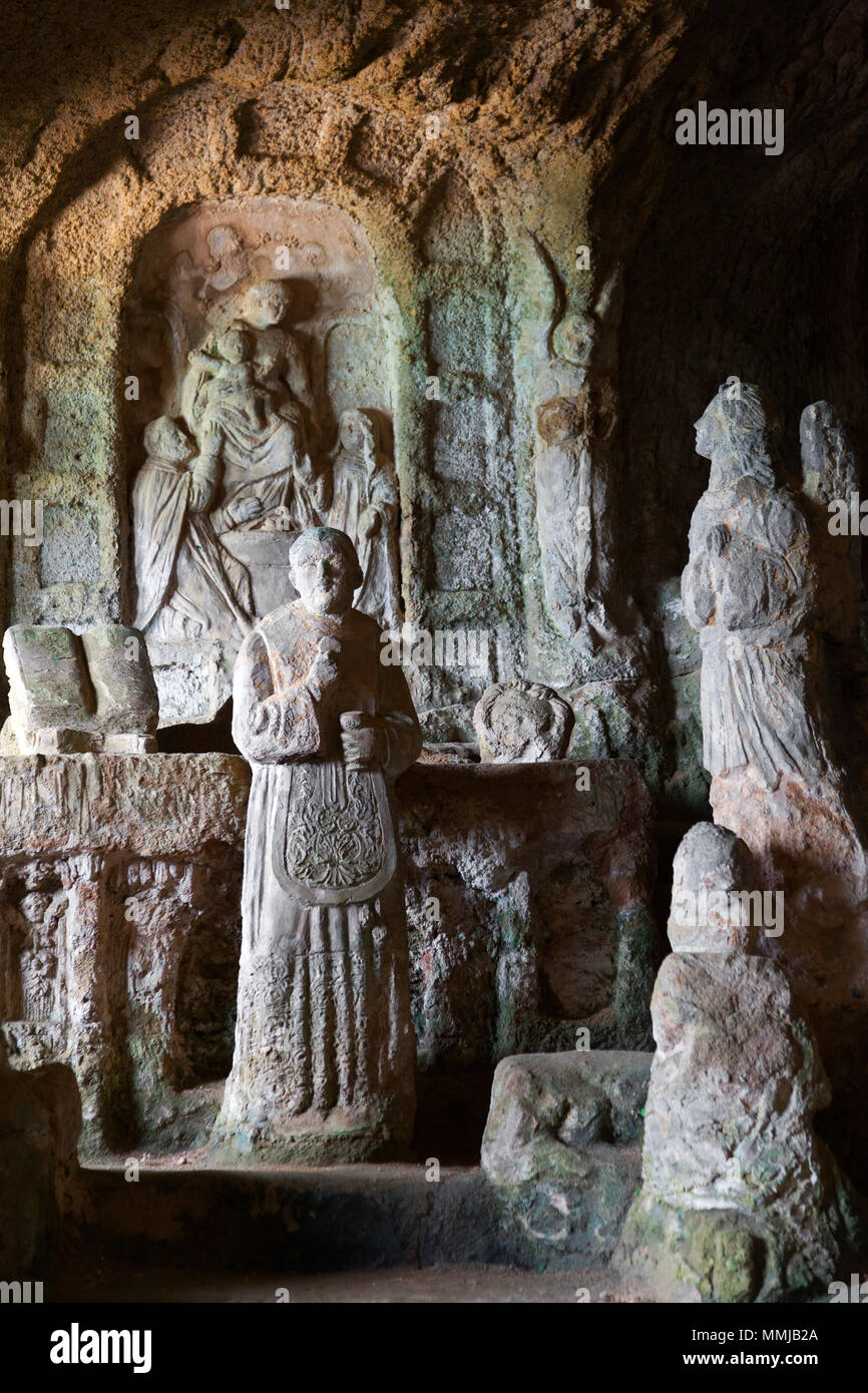 Saint statues, cave church, Chiesa die Piedigrotta, Calabria, Italy ...