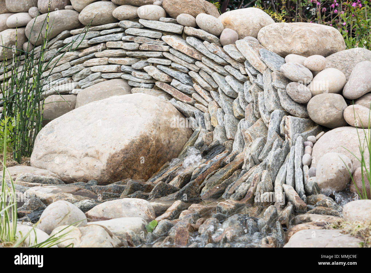 Curved dry stone wall Stock Photo - Alamy