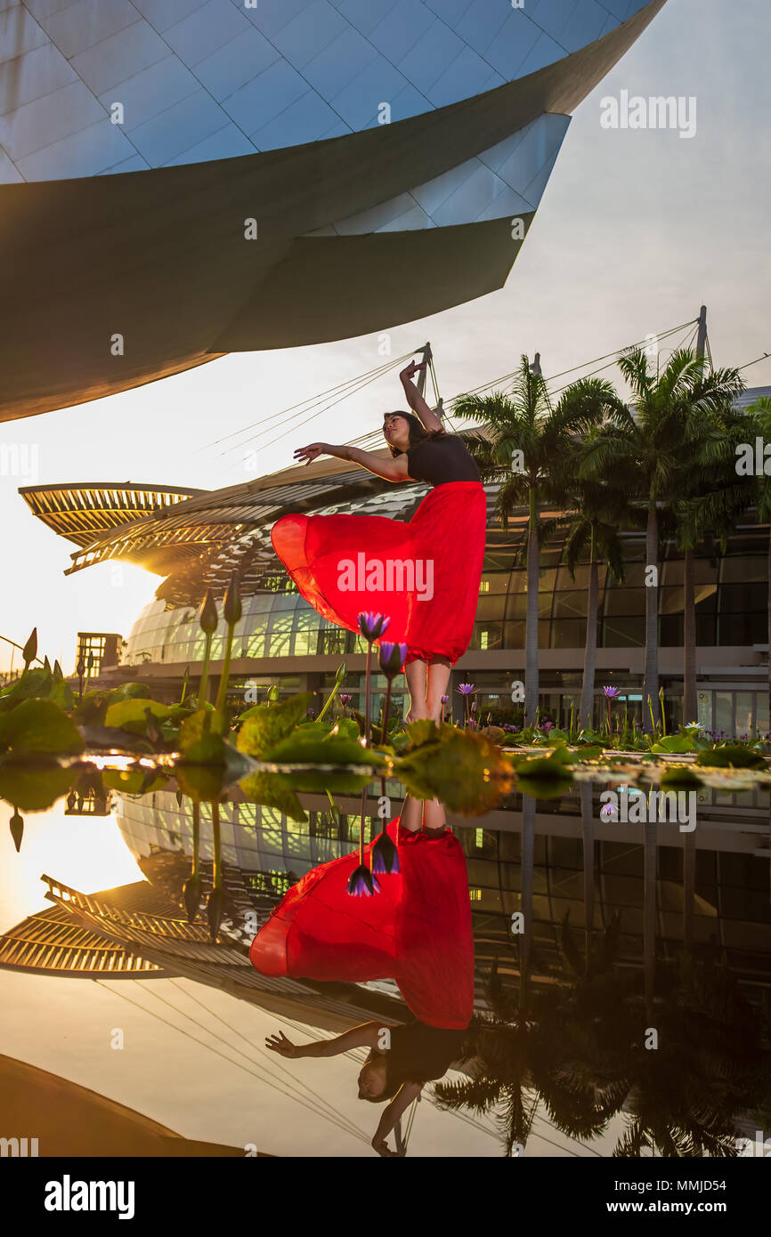 Elegant ballet dancer woman dancing ballet in Singapore city Stock ...