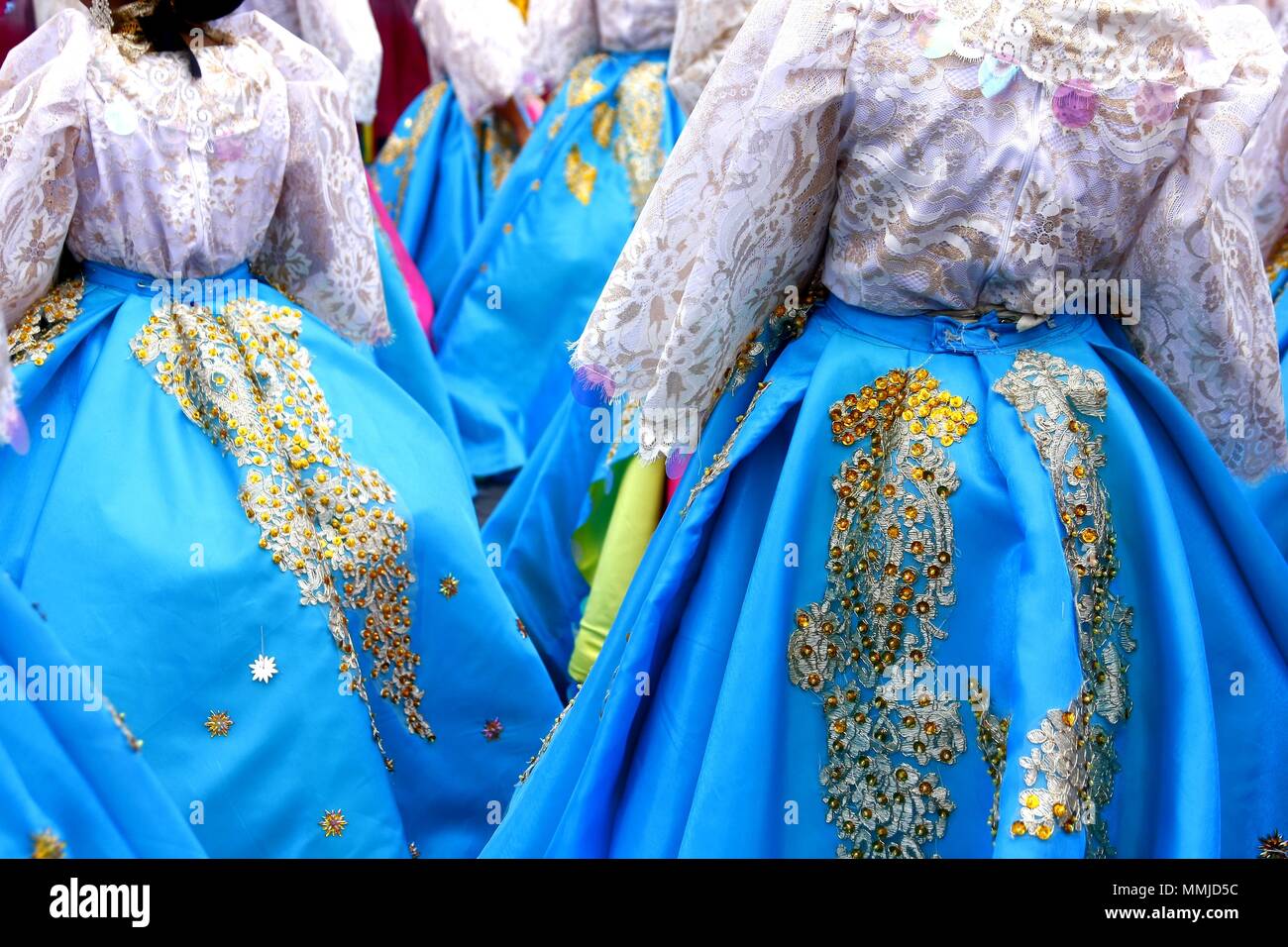 Photo of colorful costumes, attire and props of parade participants ...